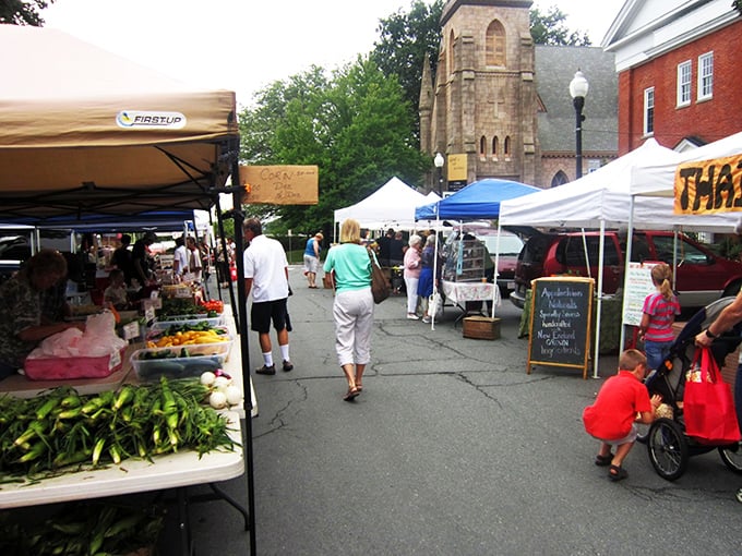The farmers market transforms church parking lots into vibrant gathering spots where neighbors connect over just-picked produce and homemade treats.