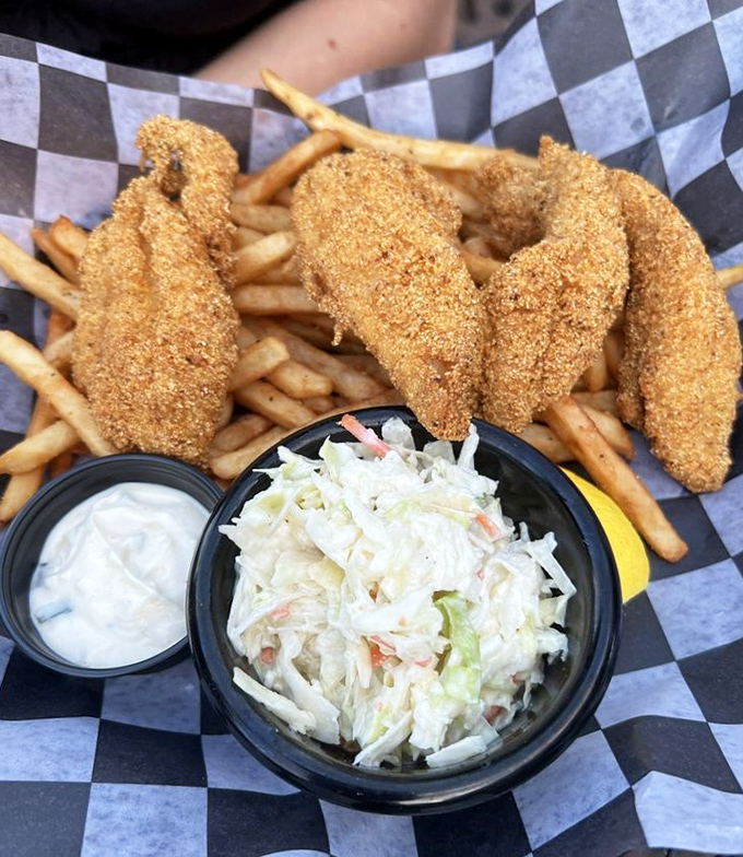 Fish and chips that would make a British pub proud. That golden coating isn't just breading&mdash;it's armor protecting precious treasures within.