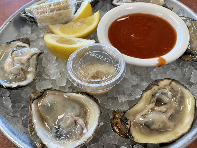 Fresh oysters on ice with lemon wedges and cocktail sauce&mdash;briny jewels that transport you straight to the coast.
