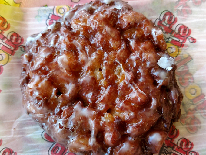 This apple fritter isn't just a donut &ndash; it's a commitment, a relationship, a journey through valleys of glaze and mountains of apple-cinnamon dough.