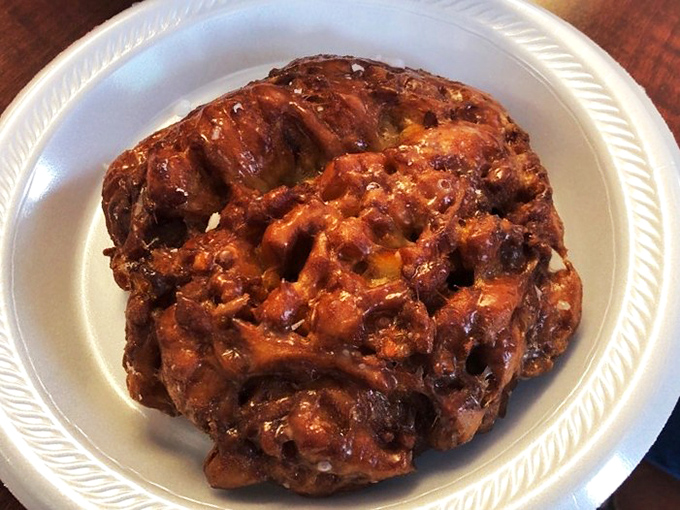 This apple fritter doesn't just look good&mdash;it's practically auditioning for a starring role in your breakfast memories. The glaze catches light like morning dew.