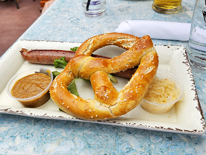 A pretzel so photogenic it probably has its own Instagram, served with mustard that's been perfecting its tang since your grandparents' first date.