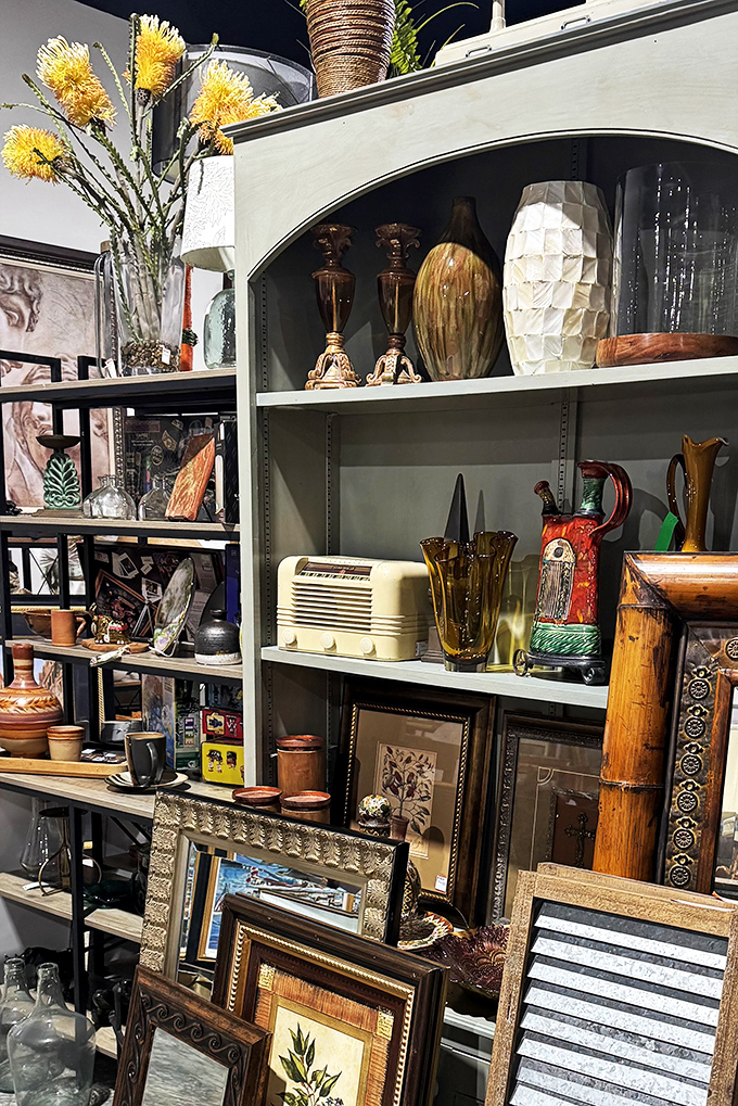 Mid-century treasures, retro radios, and artful vessels create a museum-worthy display that somehow fits perfectly in your living room too.