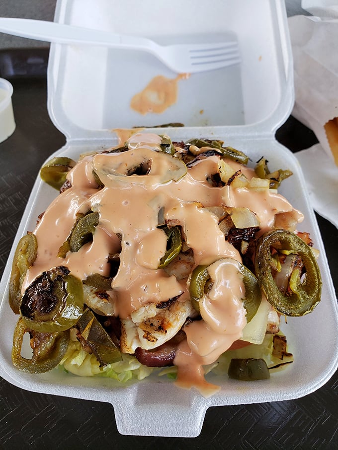 Layer upon layer of pure flavor decadence. When everything's drowning in special sauce and jalape&ntilde;os, you know you've entered the no-judgment zone of deliciousness.