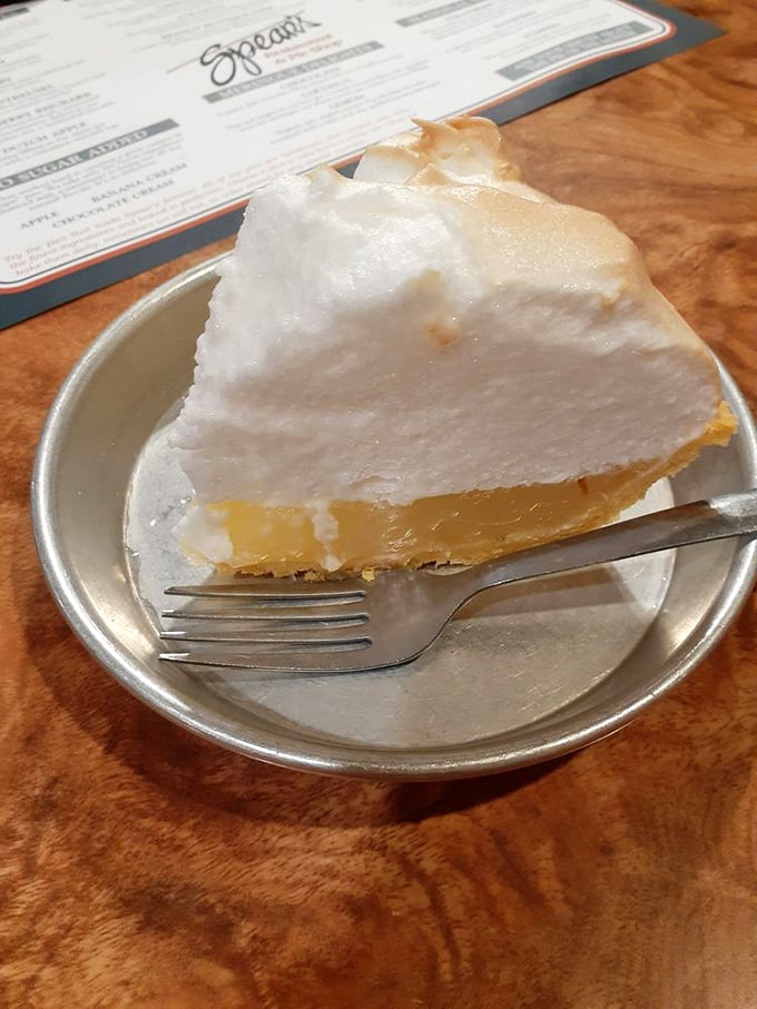 Lemon meringue pie with clouds of meringue floating above sunshine-yellow filling. This is what happiness looks like if it took dessert form.
