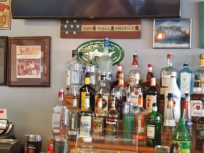 The well-stocked bar stands ready to provide the perfect liquid complement to your seafood feast&mdash;because crabs deserve proper accompaniment.