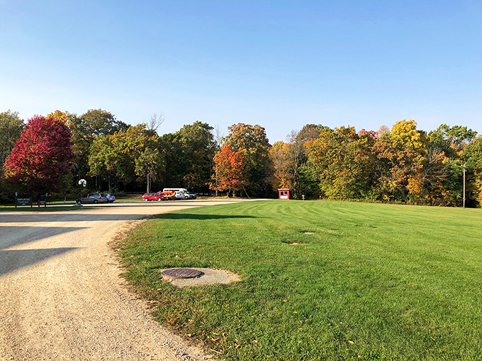 Fall colors frame the expansive grounds, offering a serene backdrop for contemplation or the perfect spot for a spontaneous cartwheel.