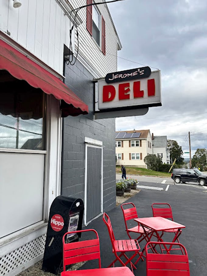 Those cherry-red chairs outside are like a beacon to sandwich pilgrims. "Rest here," they whisper, "your journey to deliciousness is complete."