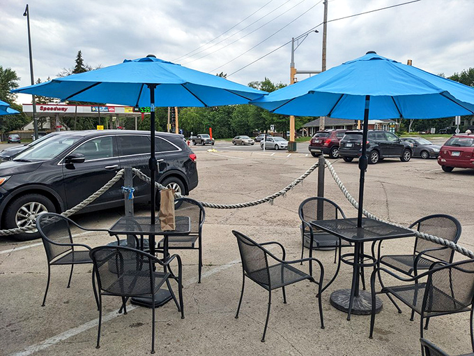Minnesota's version of oceanfront dining: blue umbrellas, metal chairs, and the sweet freedom of eating fried fish under open sky.
