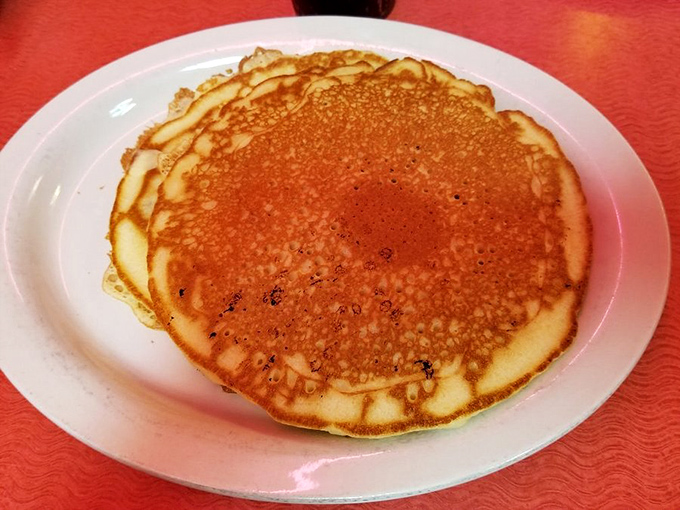 A pancake so perfectly golden it belongs in a museum, though it's much better appreciated on your fork than behind glass.