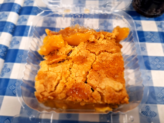 Peach cobbler that bridges the gap between dessert and religious experience. That golden crust is like edible sunshine covering sweet, tender peaches below.