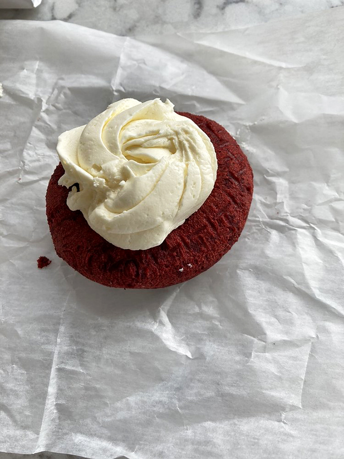 This red velvet donut with cream cheese frosting is basically cake masquerading as breakfast. And we're completely fine with that.