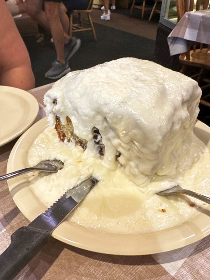 This isn't just a dessert; it's a monument to excess done right. The cream-to-cake ratio defies physics and delights taste buds.