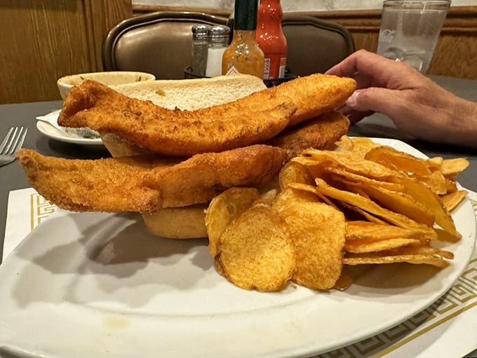 A sandwich so substantial it requires structural engineering. The chips are just there for moral support.