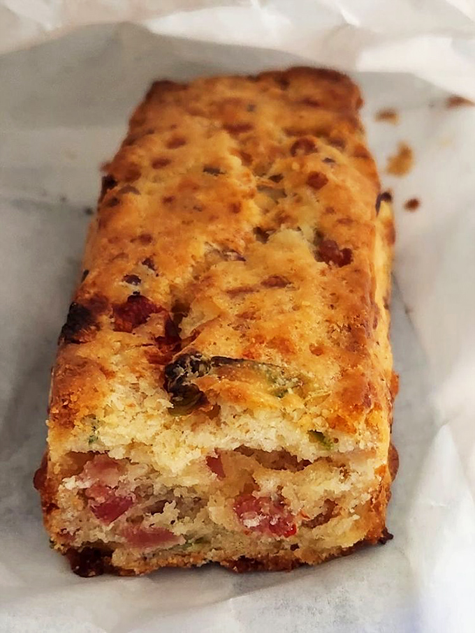 This savory scone isn't just baked; it's architected – with bits of ham and herbs creating a breakfast blueprint worth framing.