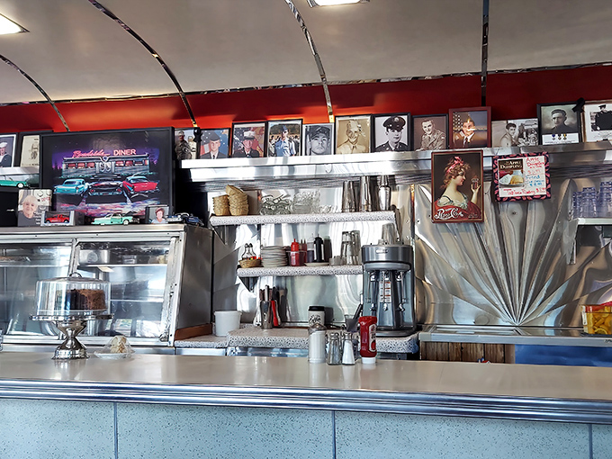 The counter area showcases vintage photos above gleaming stainless steel, where coffee percolates and pie rotates in a display case of temptation.
