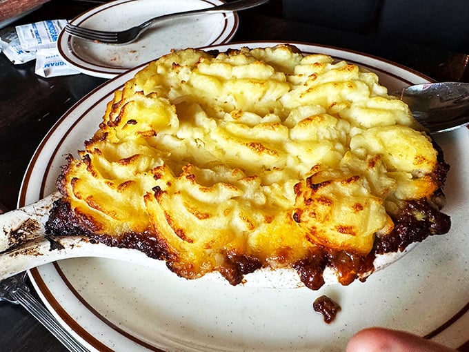 That golden-brown crust isn't just for show &ndash; it's the crispy gateway to the savory paradise waiting underneath.