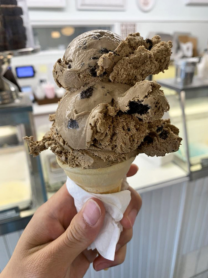 This cookies and cream cone demonstrates perfect structural integrity&mdash;important engineering when you're racing against California sunshine. 