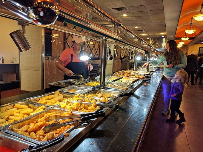 Where the magic happens &ndash; chefs keeping the buffet stocked with fresh delights. Like backstage at a rock concert, but the stars are egg rolls and sweet and sour chicken.