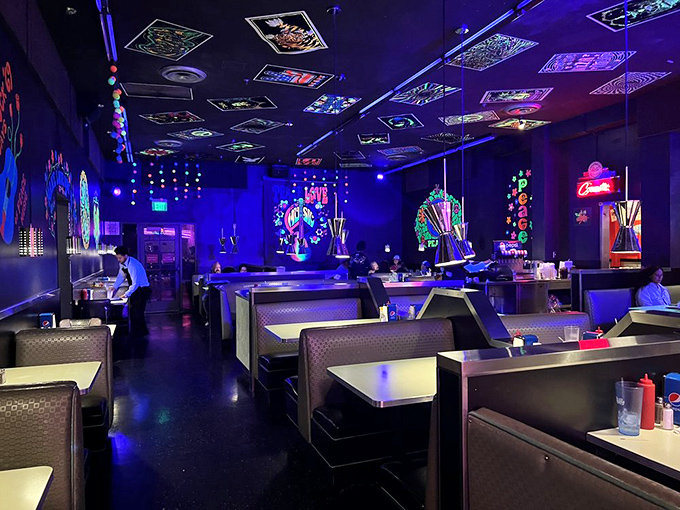 In the glow of neon blue lights, these booths await hungry time travelers seeking refuge from boring, ordinary dining experiences.