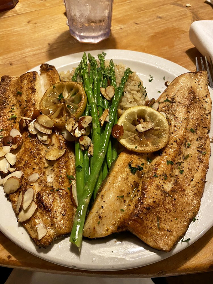Trout almondine that's swimming in flavor rather than water these days. The asparagus and lemon provide bright counterpoints to the buttery fish.