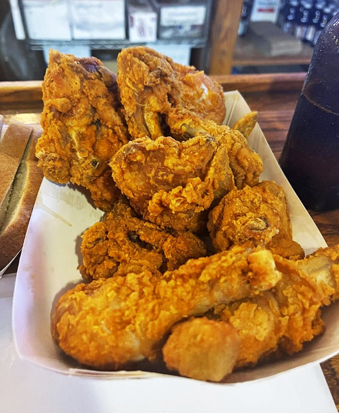 A mountain of golden-brown joy that makes grown adults giddy. This isn't just chicken; it's an edible Oklahoma institution.