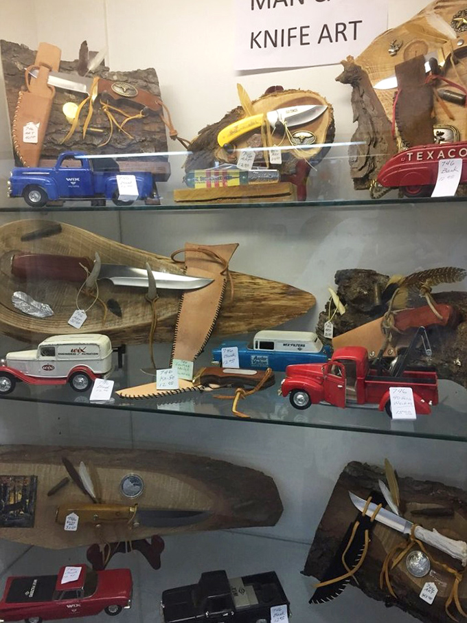 Custom knives and vintage toy trucks share display space in this man cave treasury&mdash;because grown-up toys just cost more than their childhood counterparts.