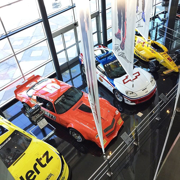 A bird's-eye view of automotive excellence. From above, these legendary racers form a colorful mosaic of speed, engineering, and human achievement.