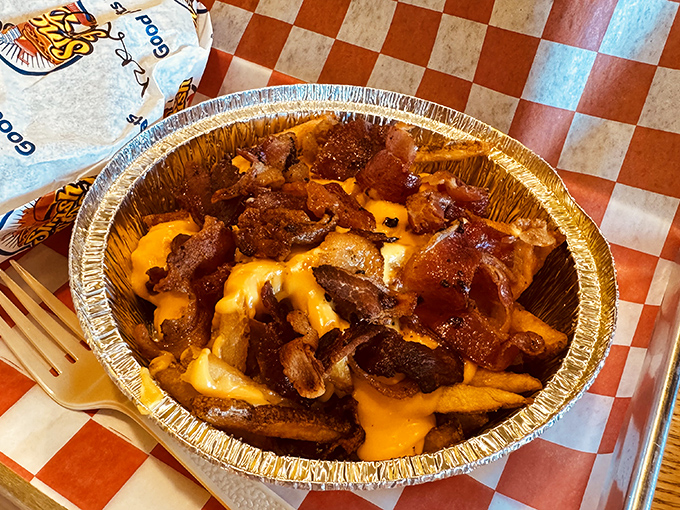 Bacon cheese fries that render conversation impossible. All you can manage is the occasional appreciative grunt as you reach for another forkful.