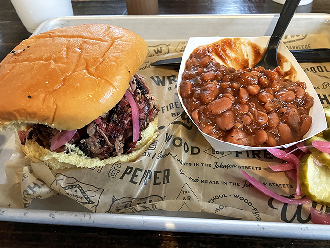 The perfect barbecue sandwich doesn't exi&mdash; Oh wait, here it is, with those pink onions and beans that have clearly been simmering since dawn.