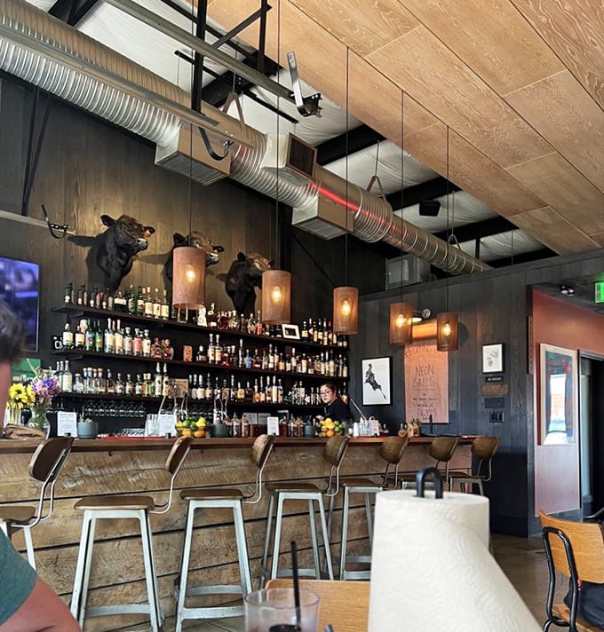 That bar isn't just serving drinks&mdash;it's completing the barbecue experience. Those bull heads? They're silently judging your sauce choices.