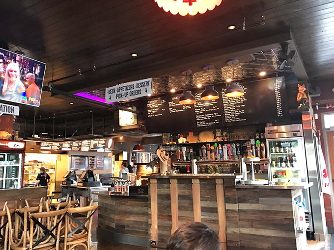 The bar area&mdash;where tap handles stand at attention, ready to pour the perfect companion to your smoky feast.