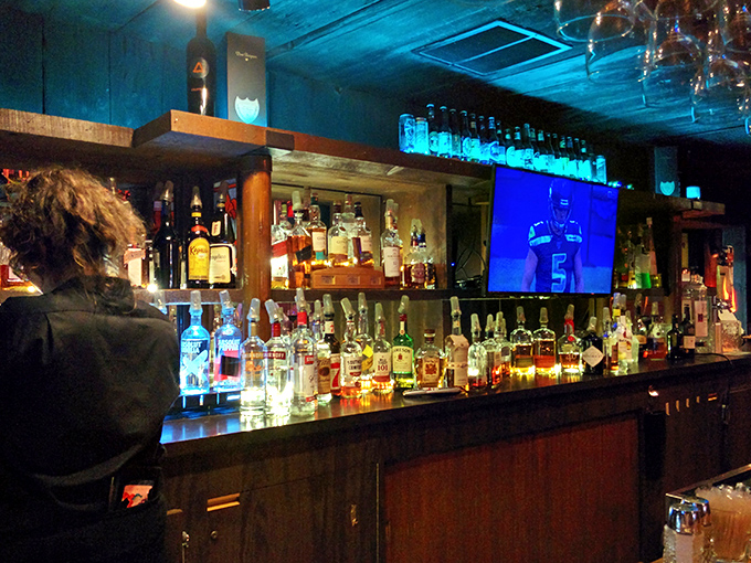 A bar stocked more thoroughly than most people's retirement portfolios. Whatever your spirit of choice, they've got you covered.