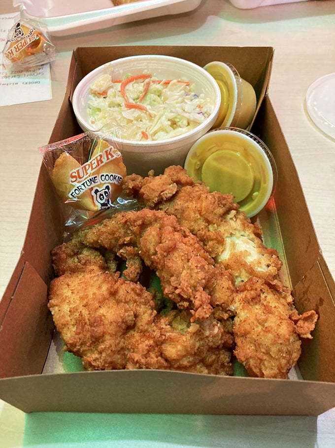 Golden-fried chicken tenders that crunch loud enough to turn heads. Served with creamy coleslaw and a pickle&mdash;comfort food elevated to art form. 