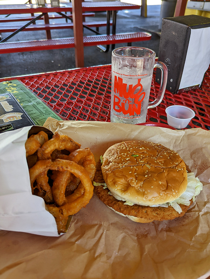 The breaded tenderloin &ndash; Indiana's gift to sandwich architecture. When your protein dramatically outgrows its bun, you know you're in the Midwest.