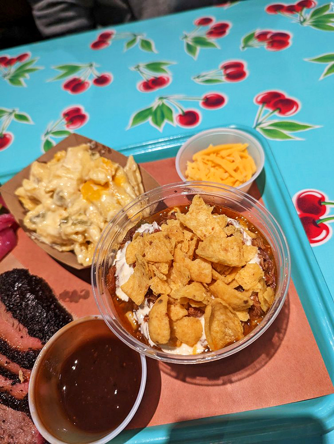 The kind of to-go container that makes you drive home very carefully. Those pickled onions and jalape&ntilde;os cut through the richness like old friends. 