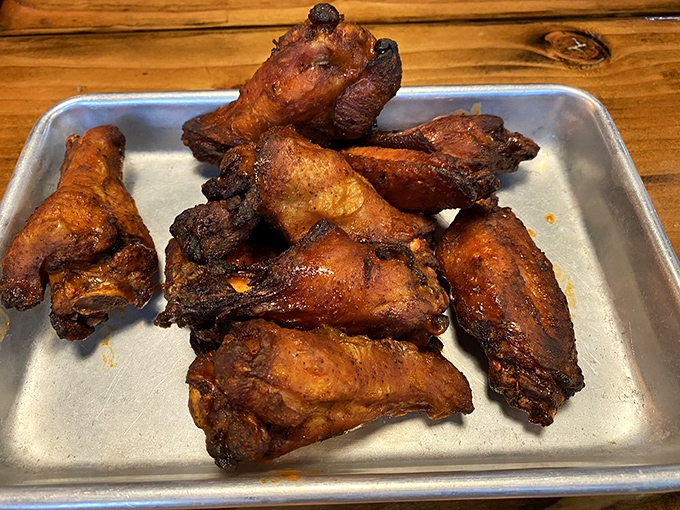 These wings have clearly been introduced to heat twice&mdash;once in the smoker and again in the fryer&mdash;resulting in a texture that's nothing short of chicken alchemy.