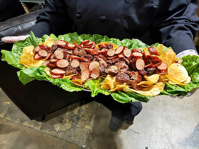 A meat platter that doubles as edible art. The chef clearly understands that presentation matters, even when it's destined for delicious destruction.