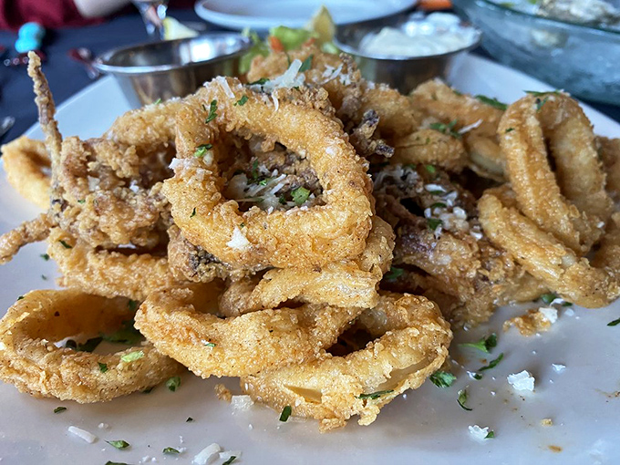 Golden-fried calamari that shatters with each bite, proving that sometimes the best appetizers are the ones that crunch loud enough for neighbors to hear.