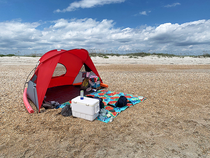 Beach camping perfected: just you, the essentials, and endless horizon. This simple setup is everything you need for a day of unplugged bliss.