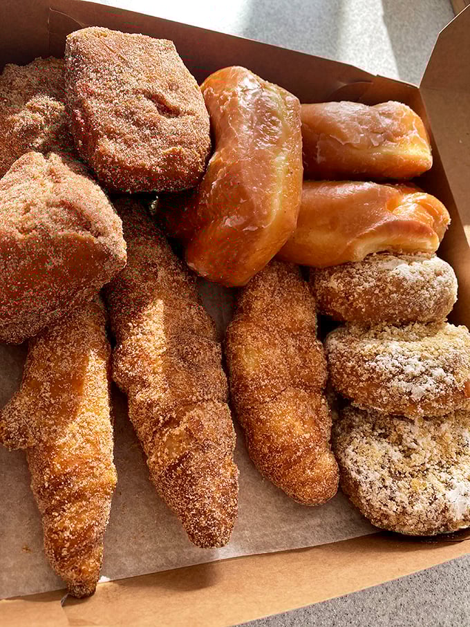 Strategic donut diversity that covers all texture bases. From pillowy glazed to the satisfying crunch of cinnamon-sugar, no craving goes unanswered.