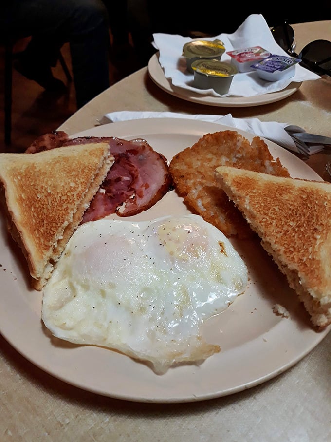 Breakfast at The Owl proves they're not just a one-trick burger pony. Those perfectly cooked eggs and golden toast would make any morning magnificent.