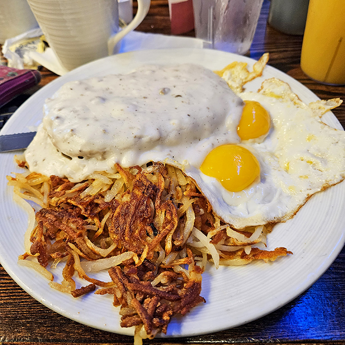 Behold the breakfast trinity&mdash;perfectly cooked eggs, hash browns with the ideal crisp-to-tender ratio, and gravy that demands bread for sopping.