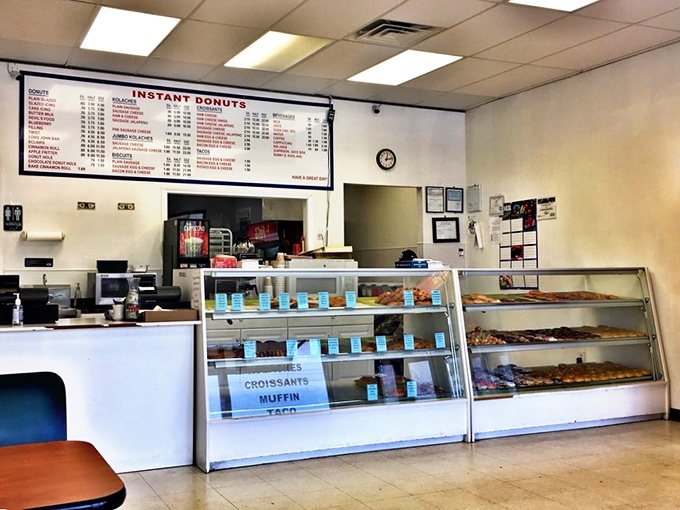 Where dreams come true: the service counter and display cases reveal rows of freshly made treats, still warm from their oil bath.