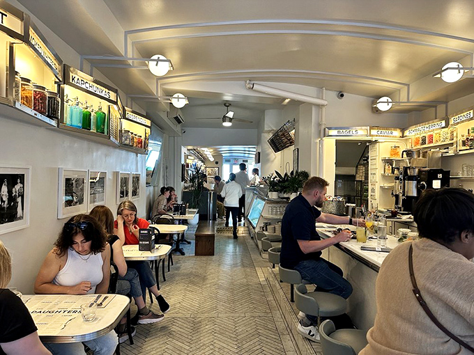 The narrow, bustling space hosts a parade of New Yorkers from all walks of life, united by their appreciation for perfect smoked fish.