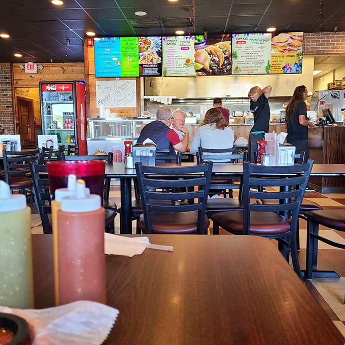 Fellow diners focused intently on their meals&mdash;the universal body language of "please don't talk to me until I've finished this amazing taco."