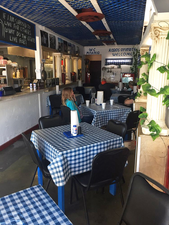 Blue and white checkered tablecloths transport you straight to a seaside taverna, minus the airfare and jet lag.
