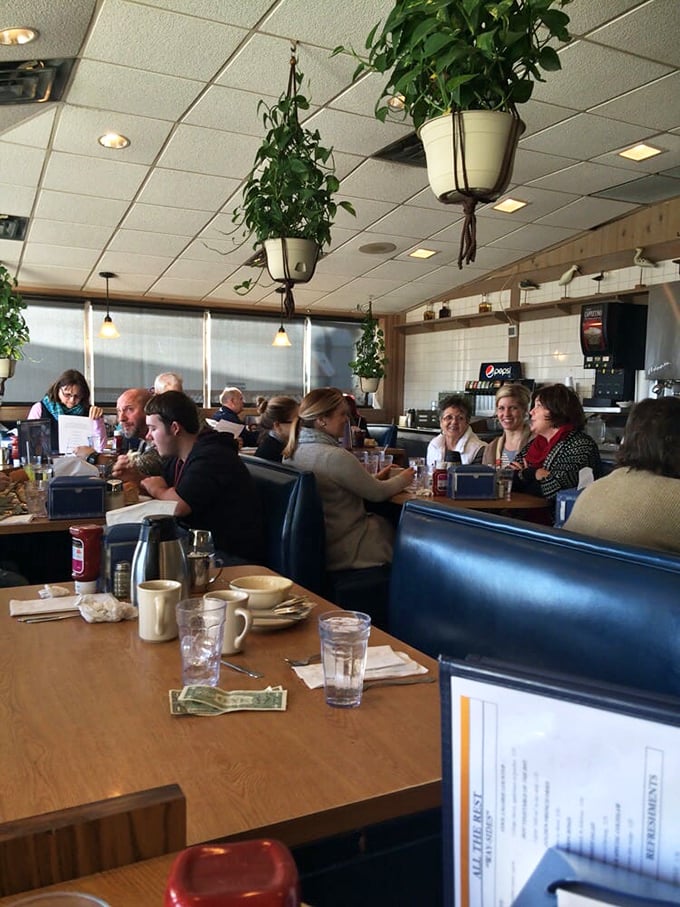 Where strangers become temporary dining companions. The bustling dining room hums with the universal language of good food.
