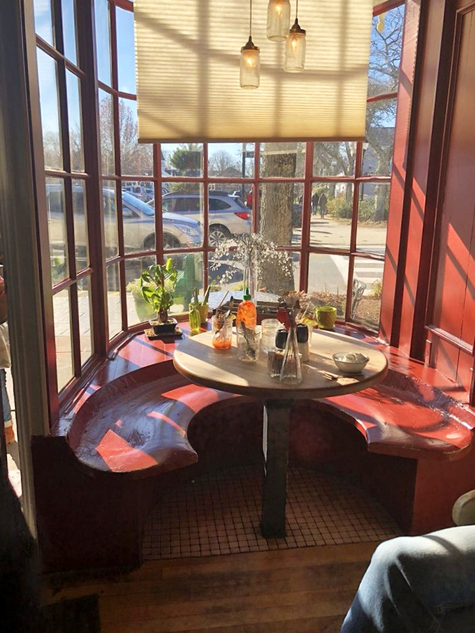 This sun-drenched nook with curved windows offers the kind of intimate dining spot where breakfast conversations turn into afternoon philosophizing.