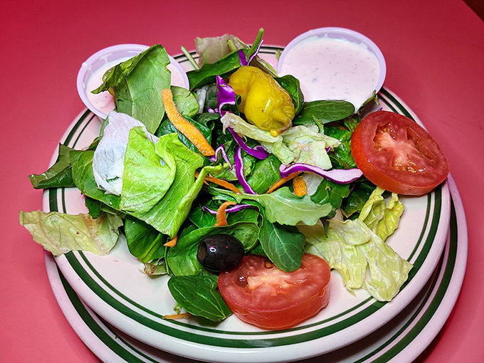 Even the salad deserves attention at Nate's. Fresh, colorful, and crisp&mdash;the palate cleanser between seafood indulgences.